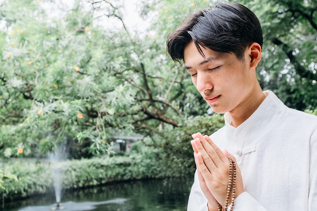 "Asian Man With Zen Buddha Gesture" by Stocksy Contributor "Pansfun ...