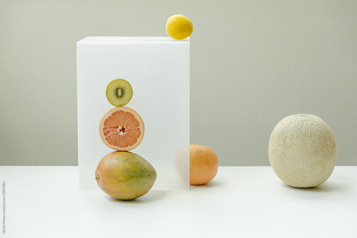 "Fruits Stacked In A Creative Still Life With Translucent Box" by ...