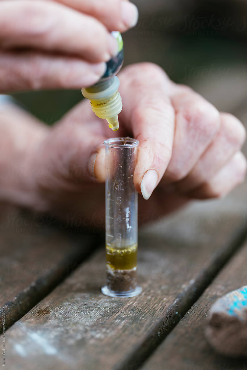 "PH Testing Of Soil" by Stocksy Contributor "Harald Walker" - Stocksy