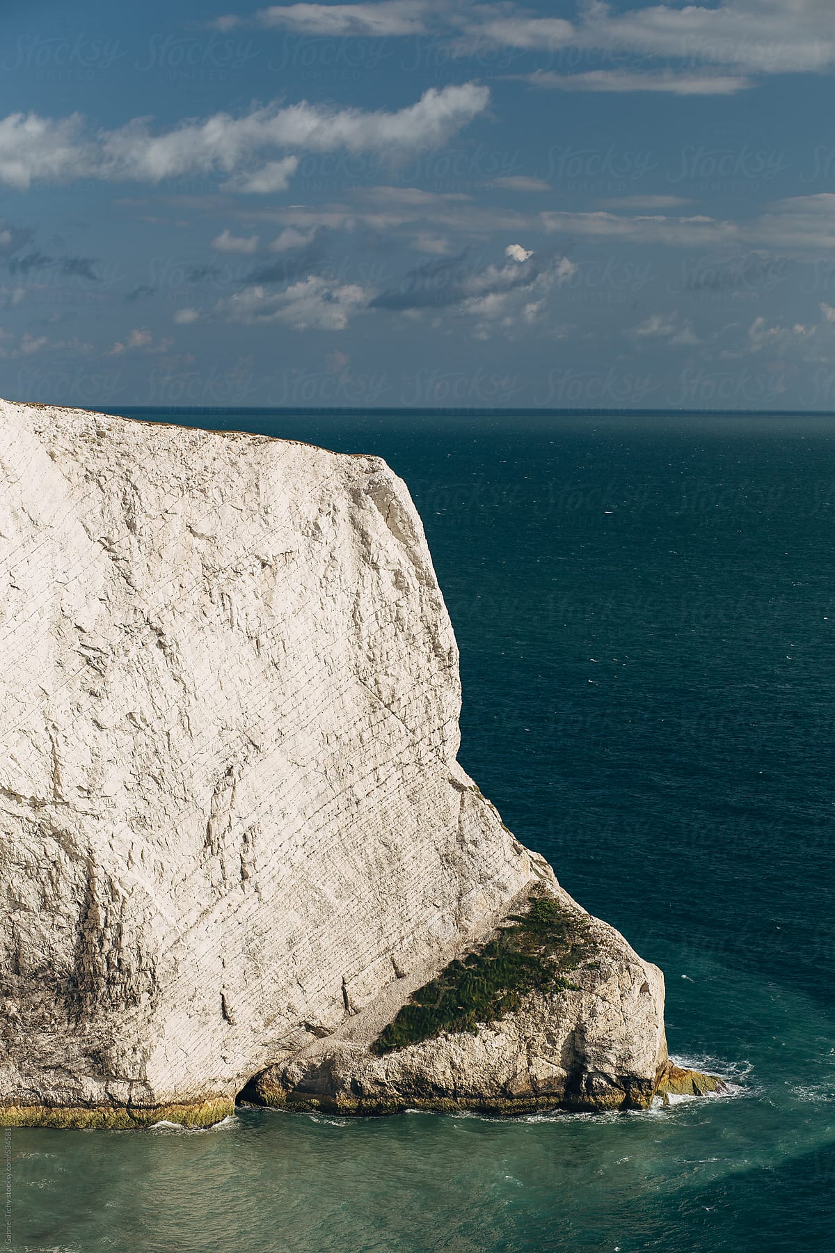 "Seaside With Cliff" by Stocksy Contributor "Gabriel Tichy" - Stocksy