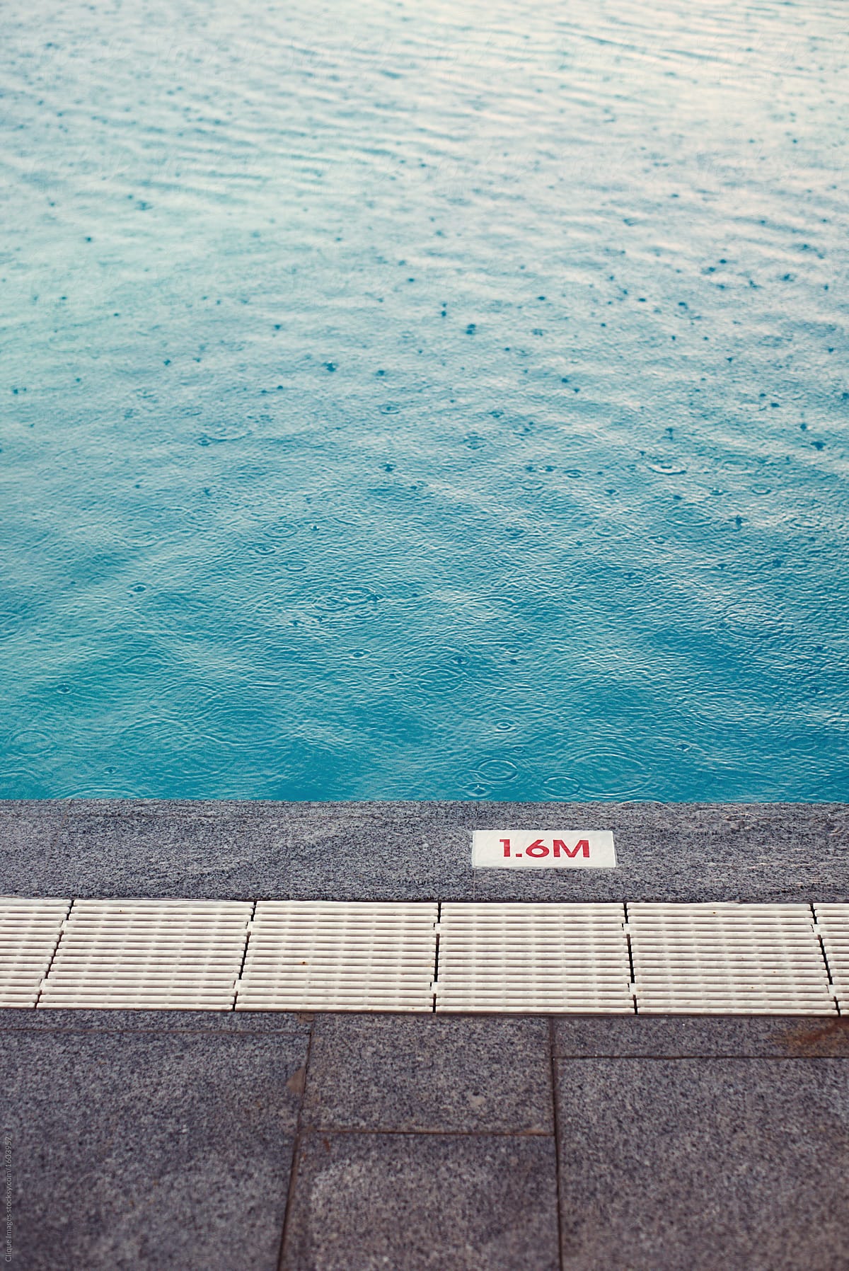 "Swimming Pool In The Rain" by Stocksy Contributor "Clique Images ...