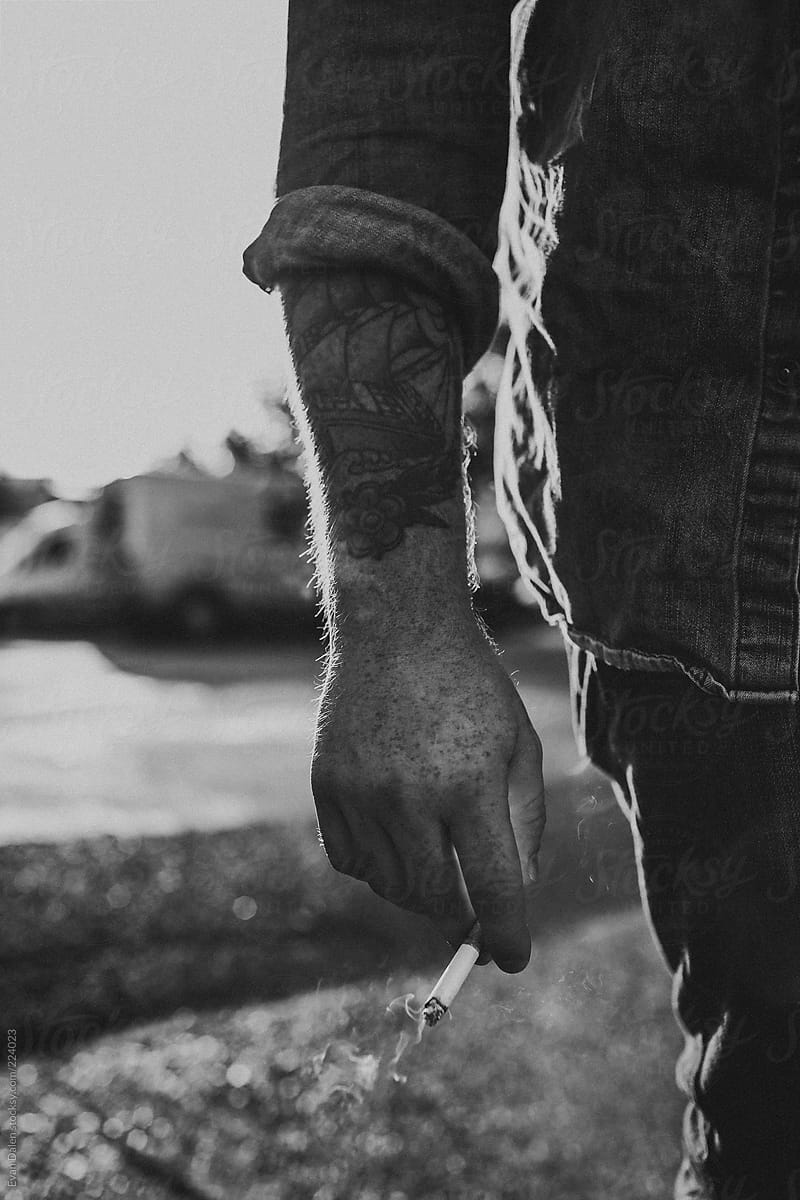 "Hand Holding A Cigarette With Tattoos" by Stocksy Contributor "Evan ...