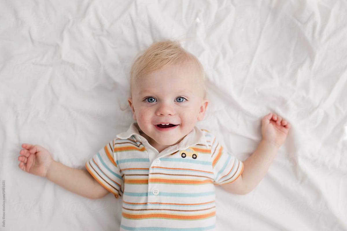 "Smiling Toddler With Two Front Teeth" by Stocksy Contributor "Kelly ...