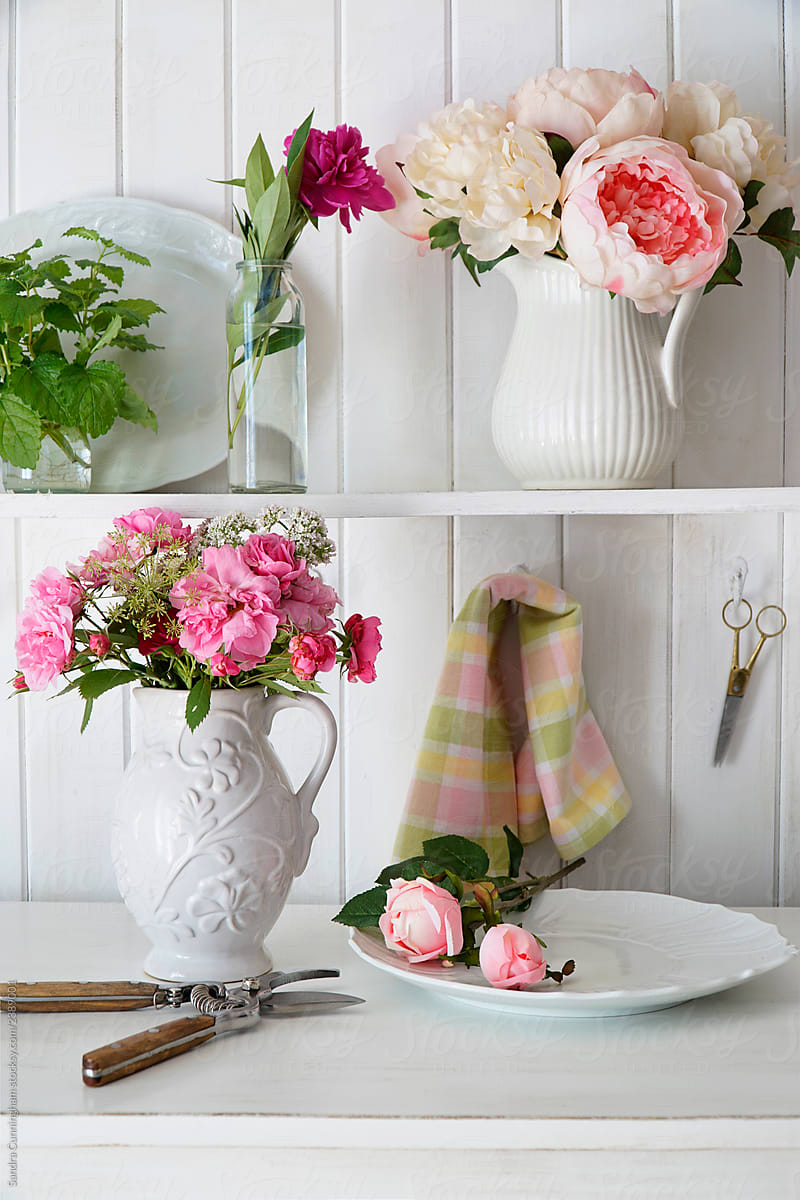 "Closeup Of Country Cupboard With Flowers In Pots" by Stocksy ...