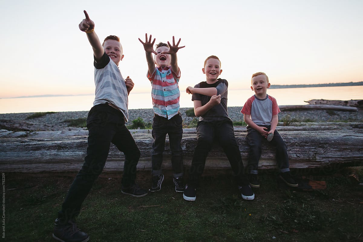 "Excited Young Boys Having Fun Together Outside Near Ocean" by Stocksy ...