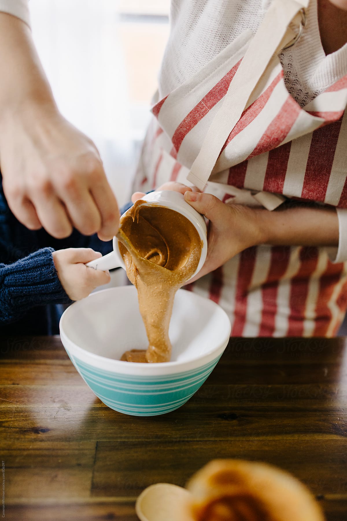 "Pouring In The Almond Butter" by Stocksy Contributor "CWP, LLC" - Stocksy