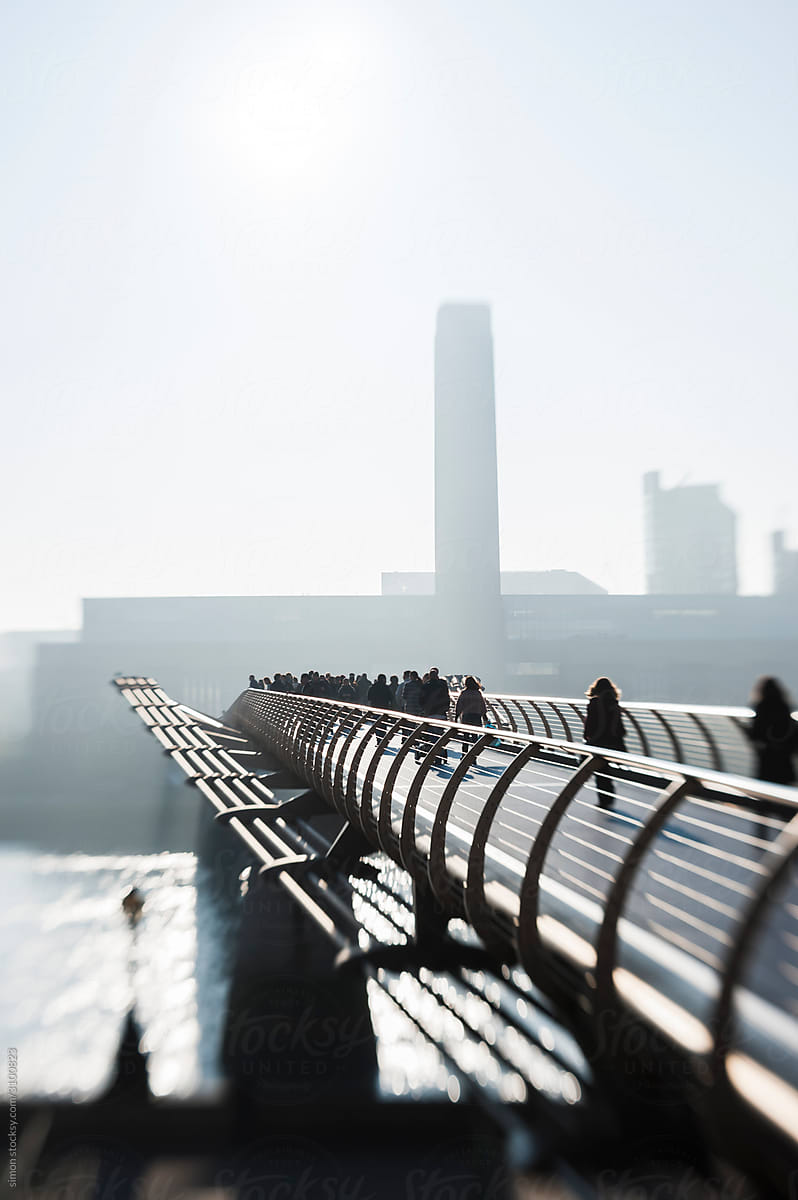 "Crowd Of People Walking On A Modern Bridge" by Stocksy Contributor ...