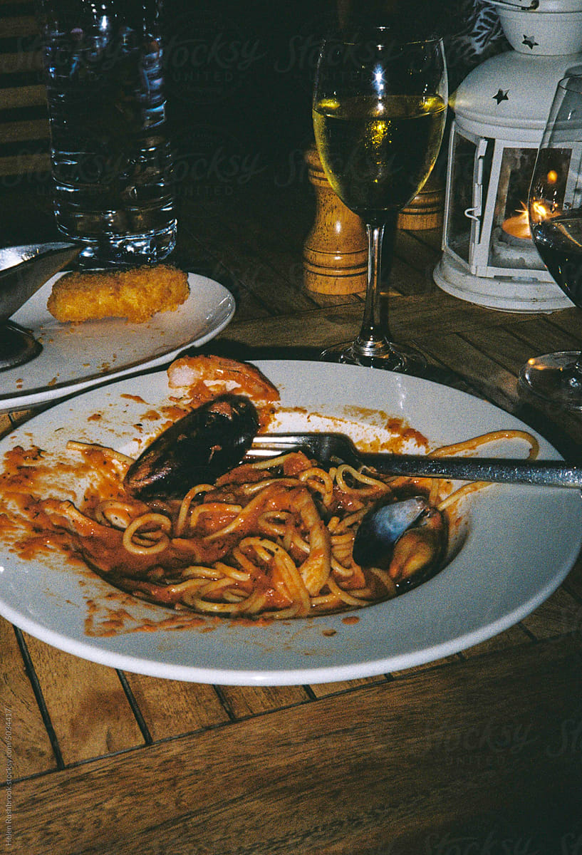 "Spaghetti At Night" by Stocksy Contributor "Helen Rushbrook" - Stocksy