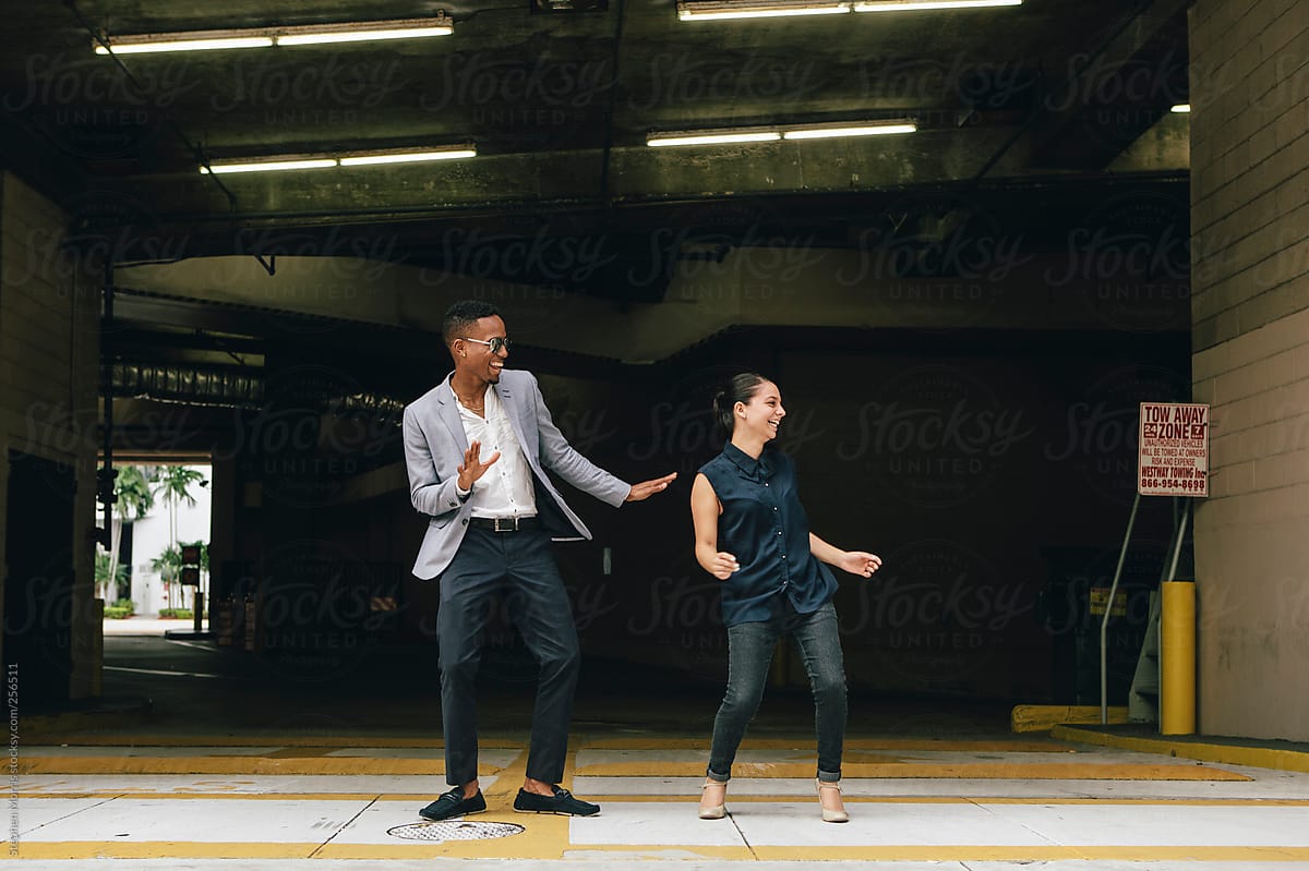 "Young Couple Dancing Downtown" by Stocksy Contributor "Stephen Morris ...