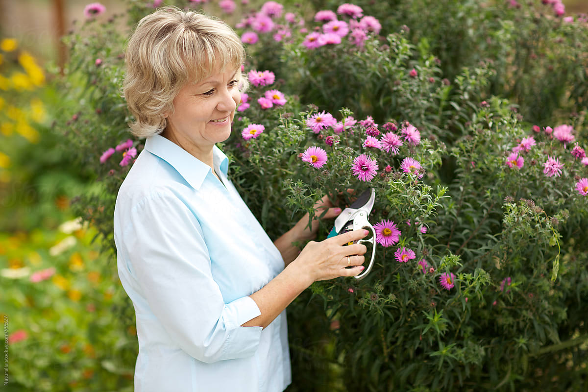 "Mature Woman Smile Garden Summer Nature Outdoors" by Stocksy ...