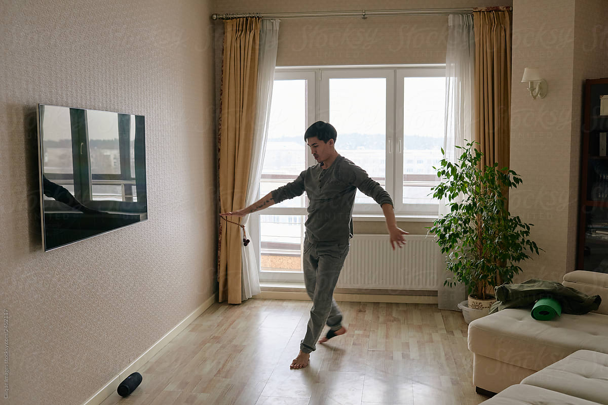 "Young Man Practicing Dance At Home" by Stocksy Contributor "Clique ...