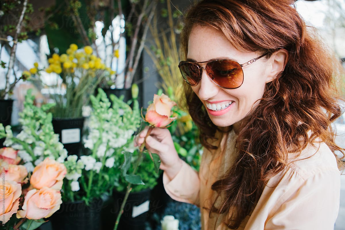 "Woman Picking Out Flowers At A Flower Shop" by Stocksy Contributor ...