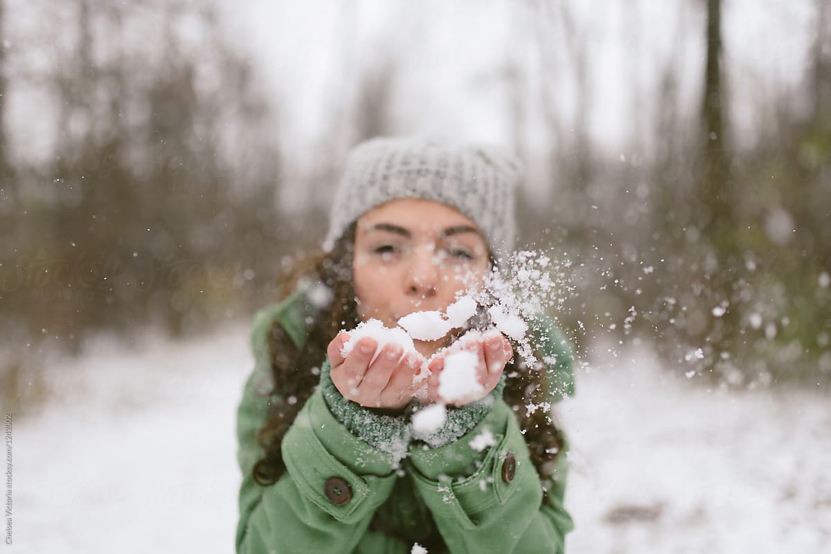 "A Young Teenager Playing With Snow" by Stocksy Contributor "Chelsea ...