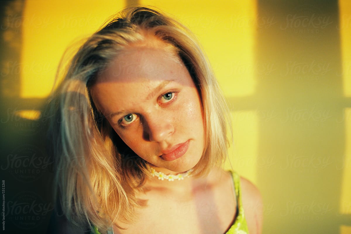 "Shadow Yellow Portrait Of Teen Girl" by Stocksy Contributor "Wendy ...