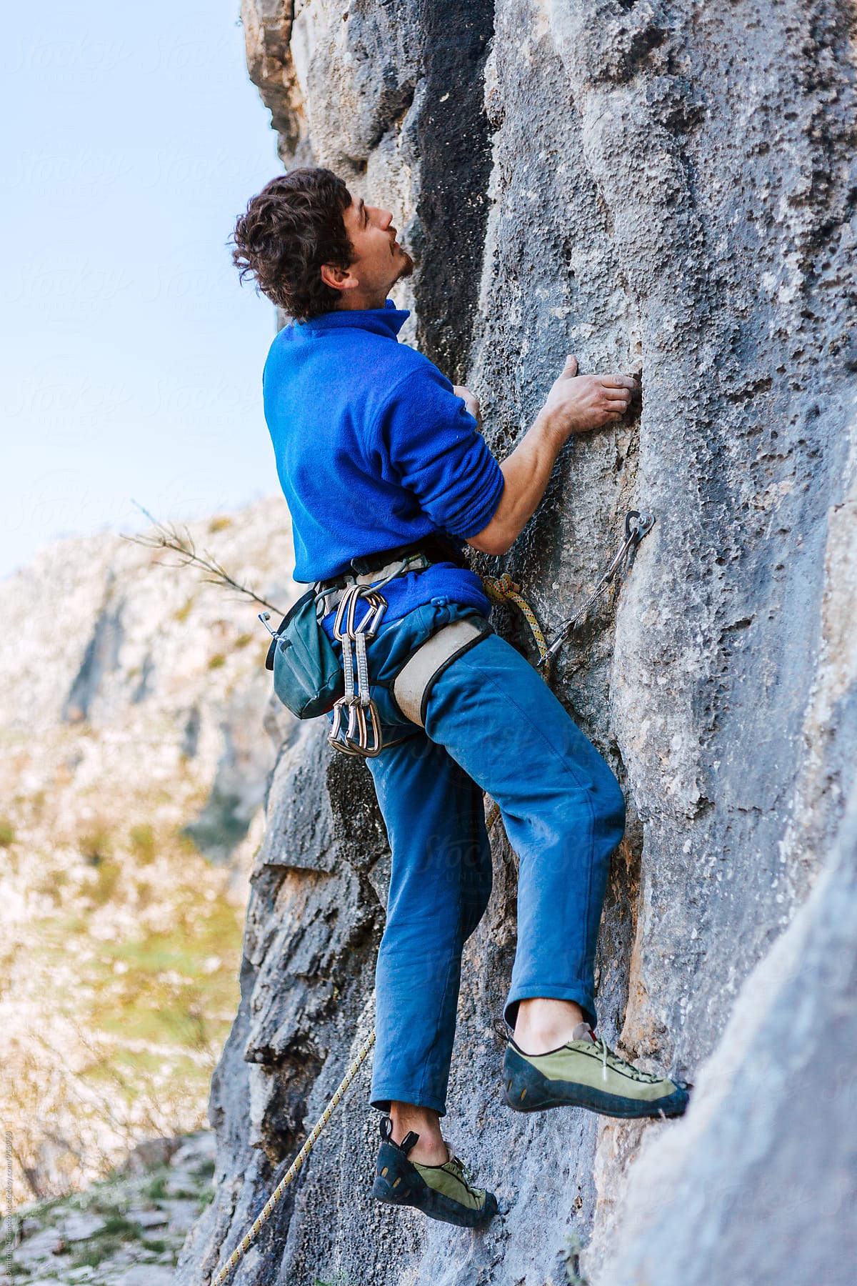 "Climbing" by Stocksy Contributor "Dimitrije Tanaskovic" - Stocksy