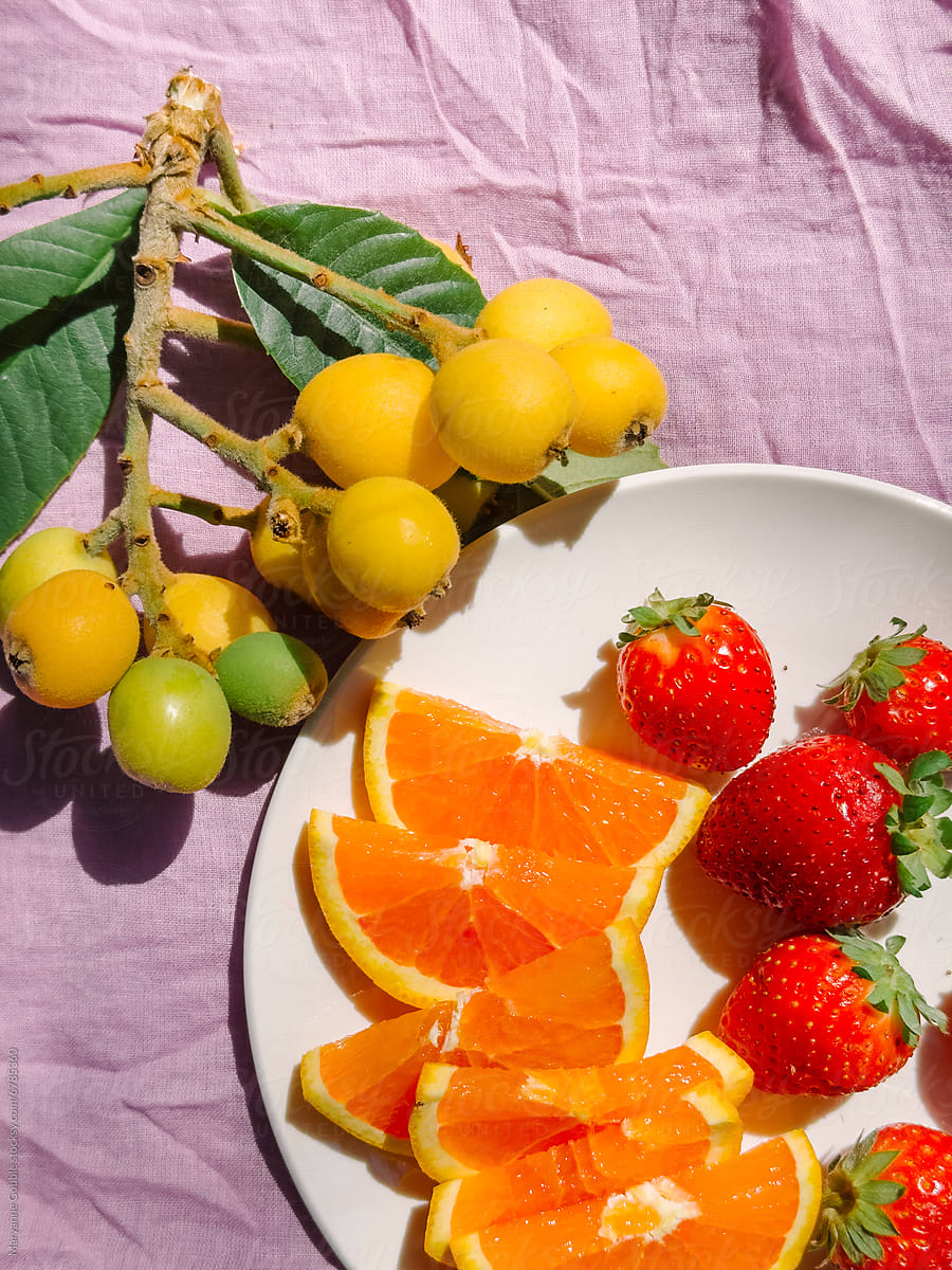 "Colorful Fruit Plate" by Stocksy Contributor "Maryanne Gobble" - Stocksy