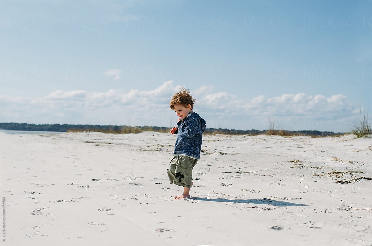 "Little Boy On Beach" by Stocksy Contributor "Ali Deck" - Stocksy