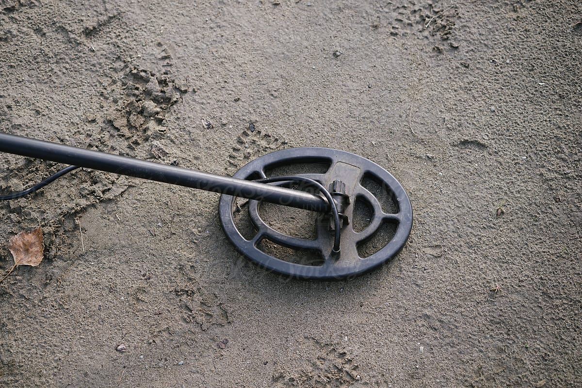 "Metal Detector Search" by Stocksy Contributor "Alessio Bogani" - Stocksy