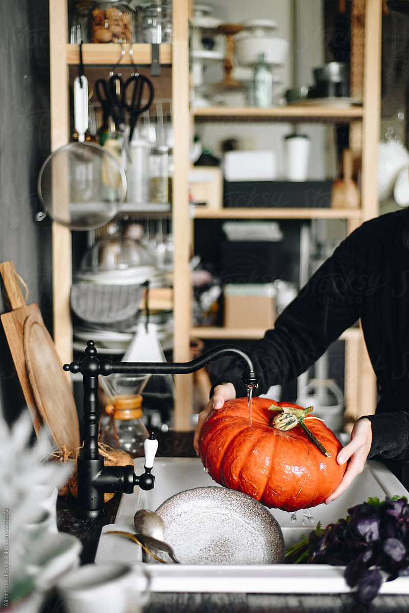 "Beautiful Female Washing Pumpkin" by Stocksy Contributor "Alina ...