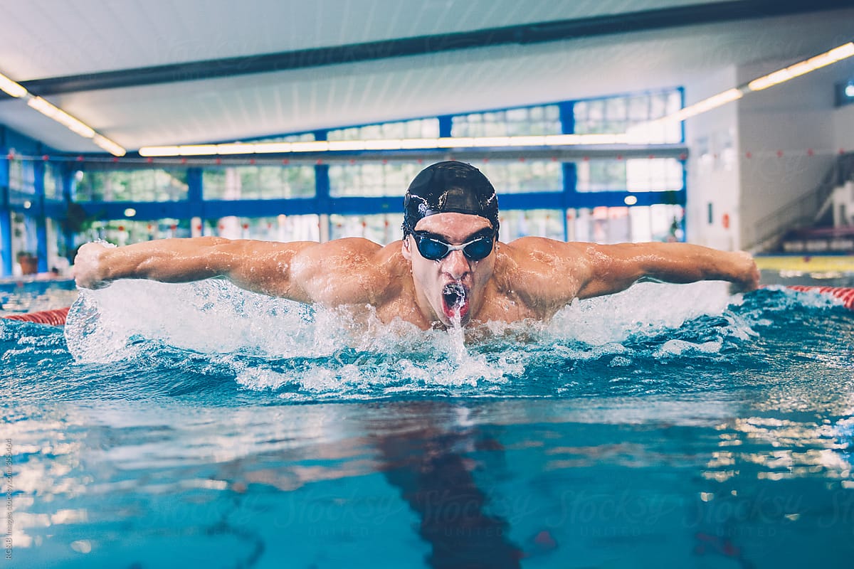 "Man Swimming Butterfly Style In An Indoor Pool" by Stocksy Contributor ...
