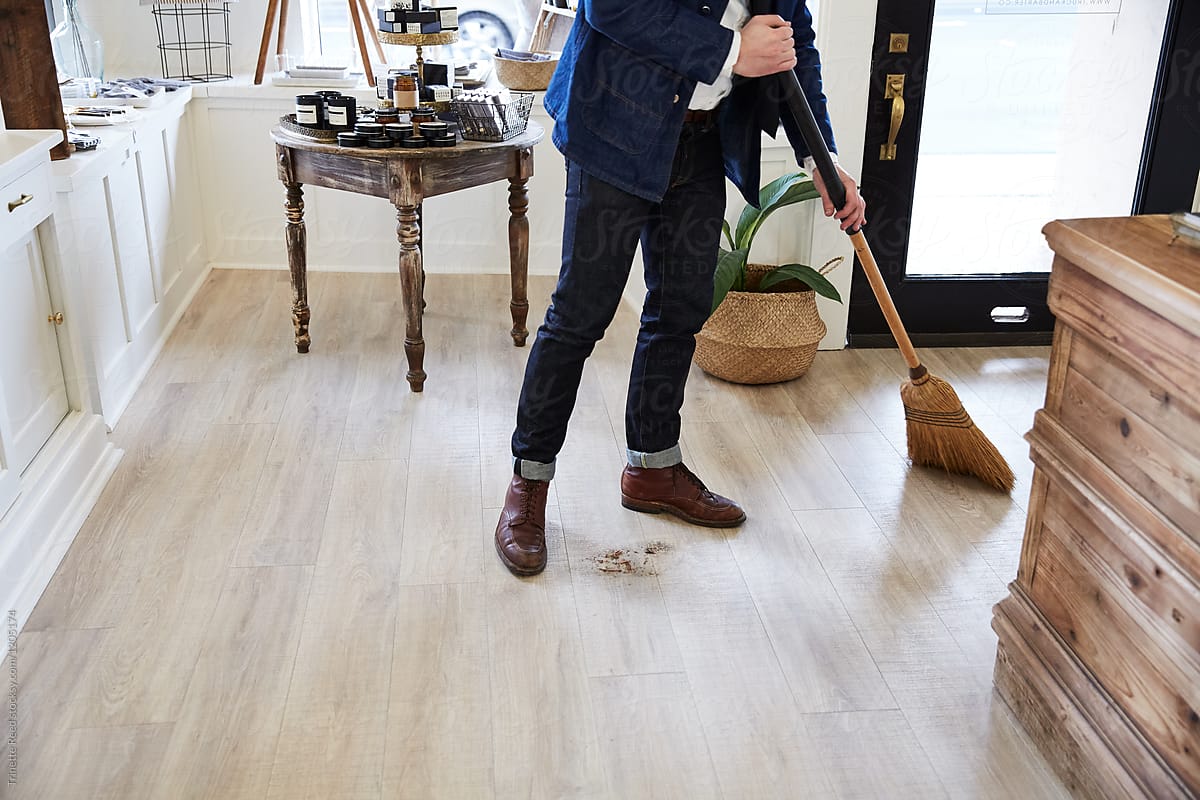 "Millennial Small Business Owner Sweeping The Floor In Artisan Retail ...