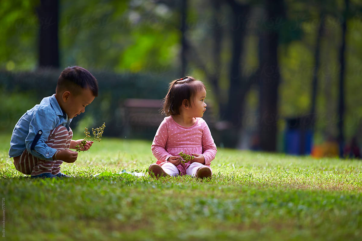 "Two Lovely Kids Together On The Lawn" by Stocksy Contributor "Bo Bo ...