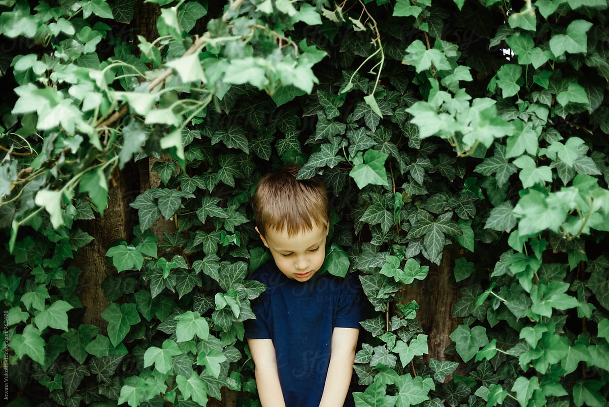 "Boy Is Playing Outside" by Stocksy Contributor "Jovana Vukotic" - Stocksy