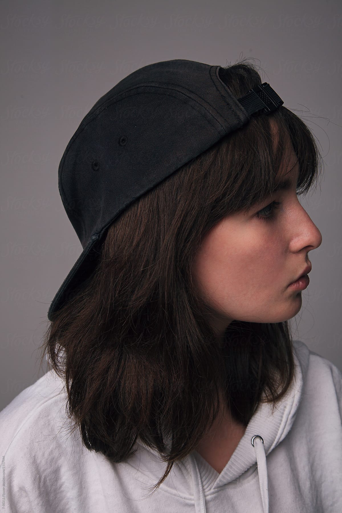 "Young Woman In Black Baseball Cap" by Stocksy Contributor "Danil ...