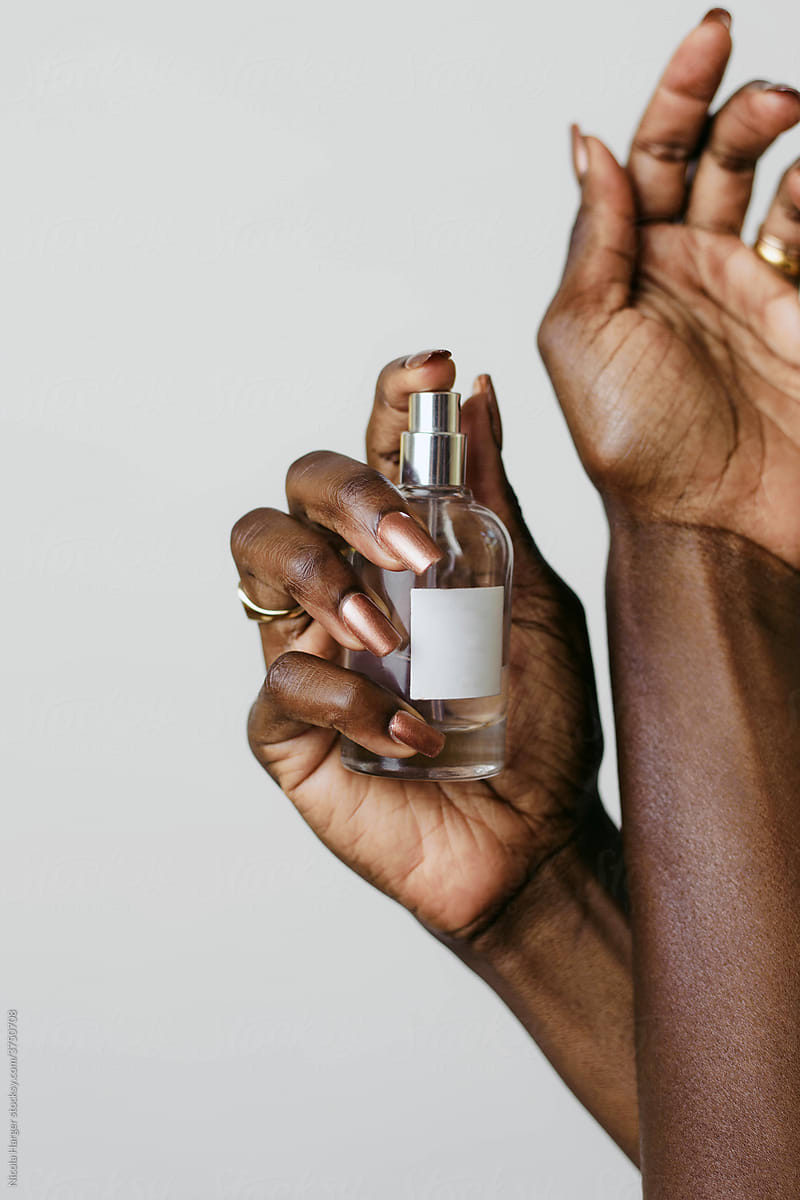 "Hand Holding Beauty Product In Glass Bottle" by Stocksy Contributor ...