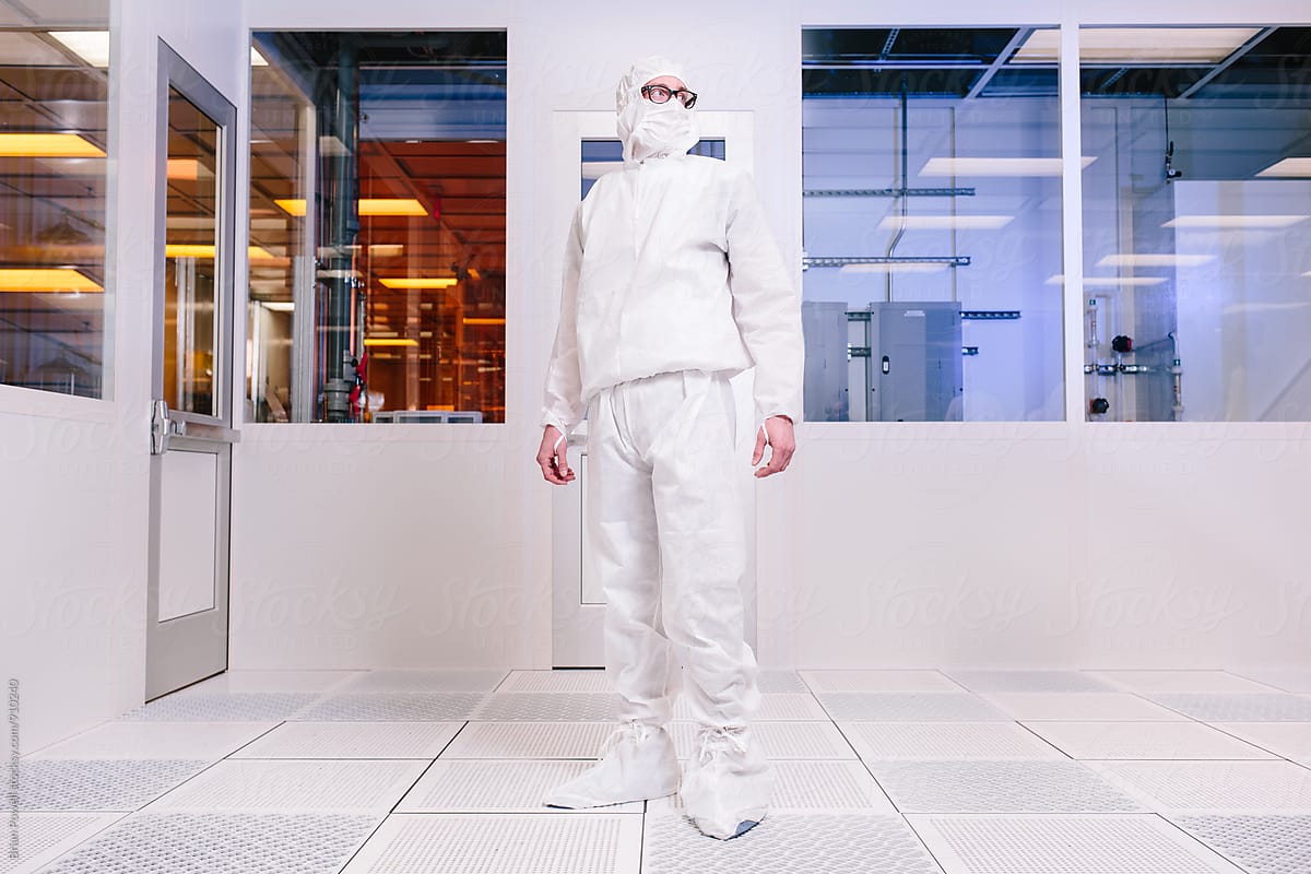 "Scientist In Empty Clean Room" by Stocksy Contributor "Brian Powell ...