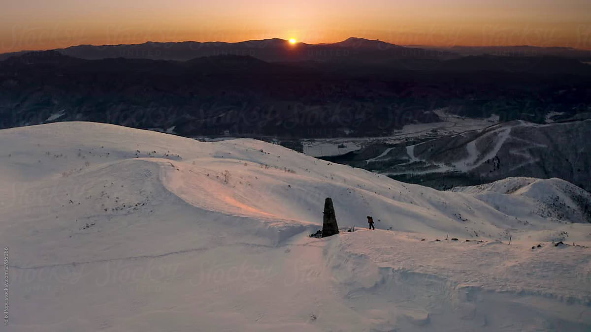 "Sunrise Snowboarding" by Stocksy Contributor "Felix Pope" - Stocksy