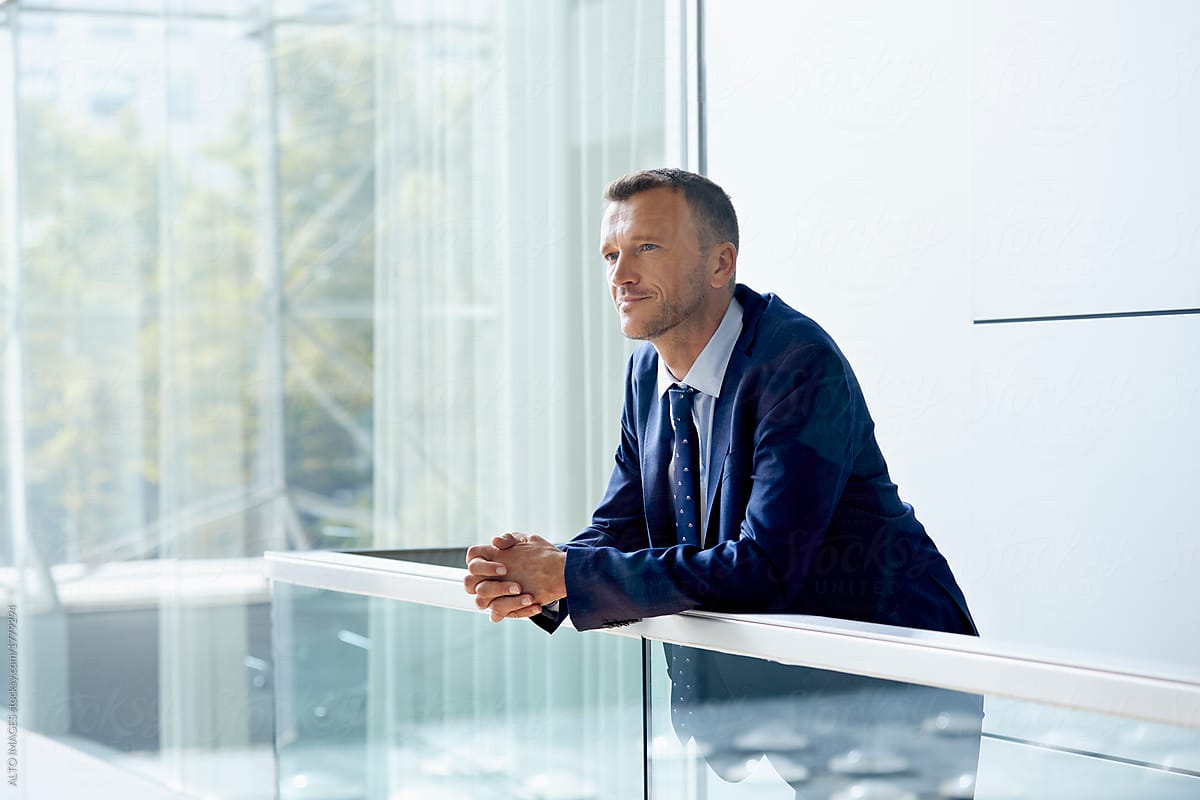 "Portrait Of Businessman Leaning On Railing" by Stocksy Contributor ...