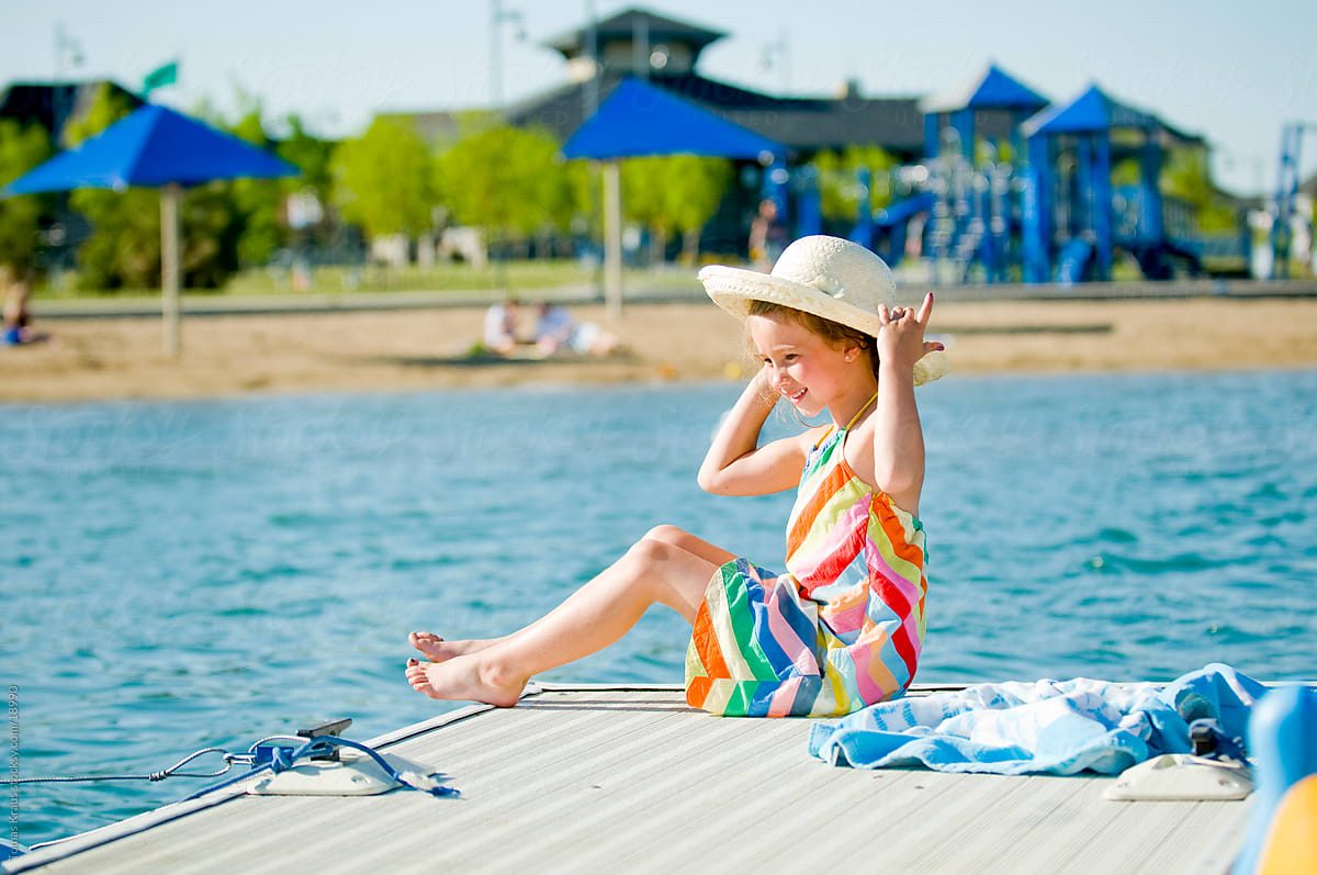"Young Girl In The Sun" by Stocksy Contributor "Tomas Kraus" - Stocksy