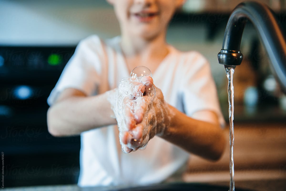 "Boy Washes His Hands With Soap In A Sink" by Stocksy Contributor "Cara ...