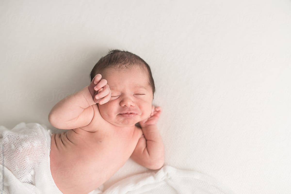 "A Baby Making A Squishy Face" by Stocksy Contributor "Alison ...