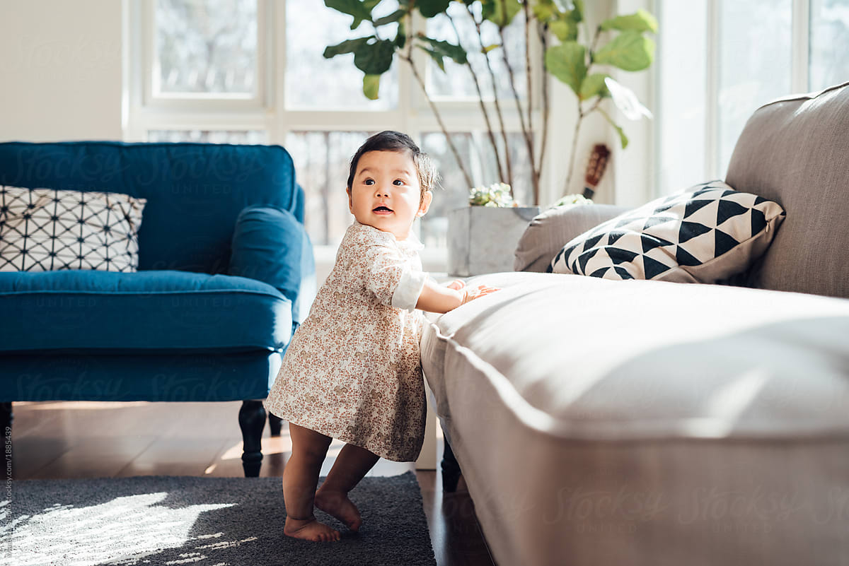"Adorable Baby Girl At Home" by Stocksy Contributor "MaaHoo" - Stocksy