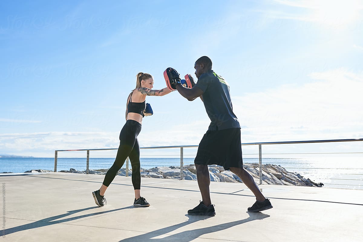 "Boxing Couple At Seaside." by Stocksy Contributor "Guille Faingold ...