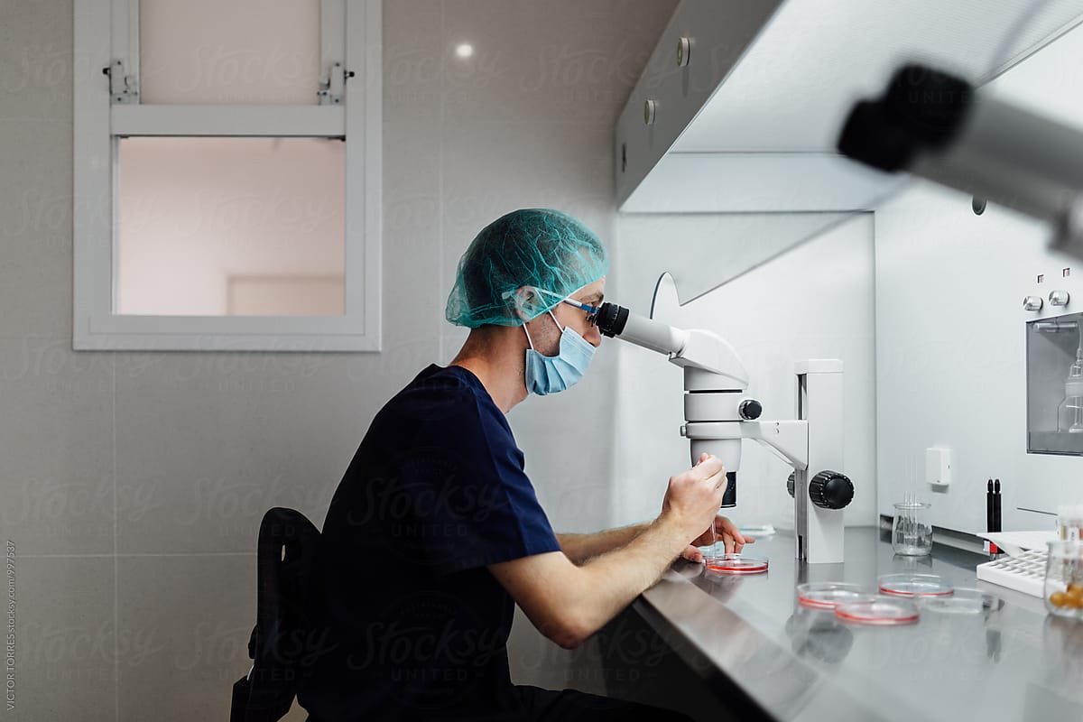 "Young Biologist Using A Microscope In The Laboratory" by Stocksy ...