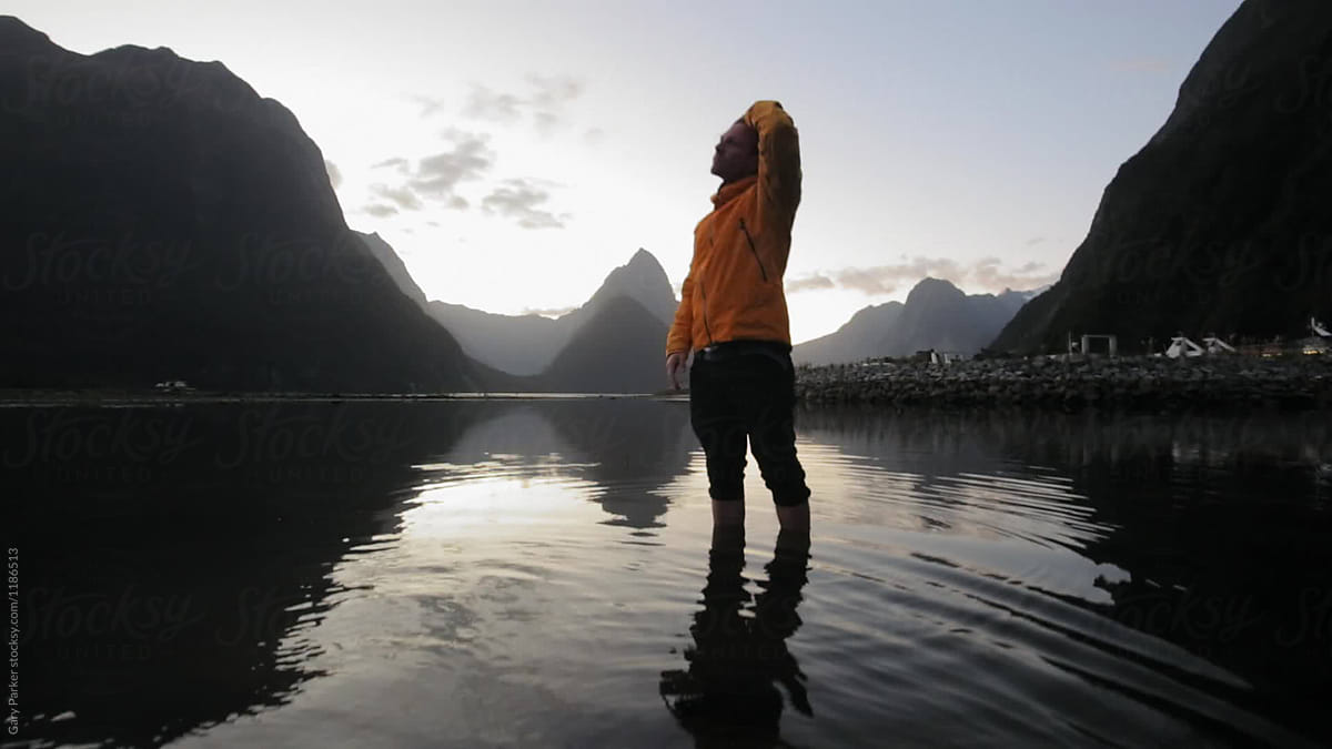 "A Young Man Standing In Awe Of His Surroundings" by Stocksy ...