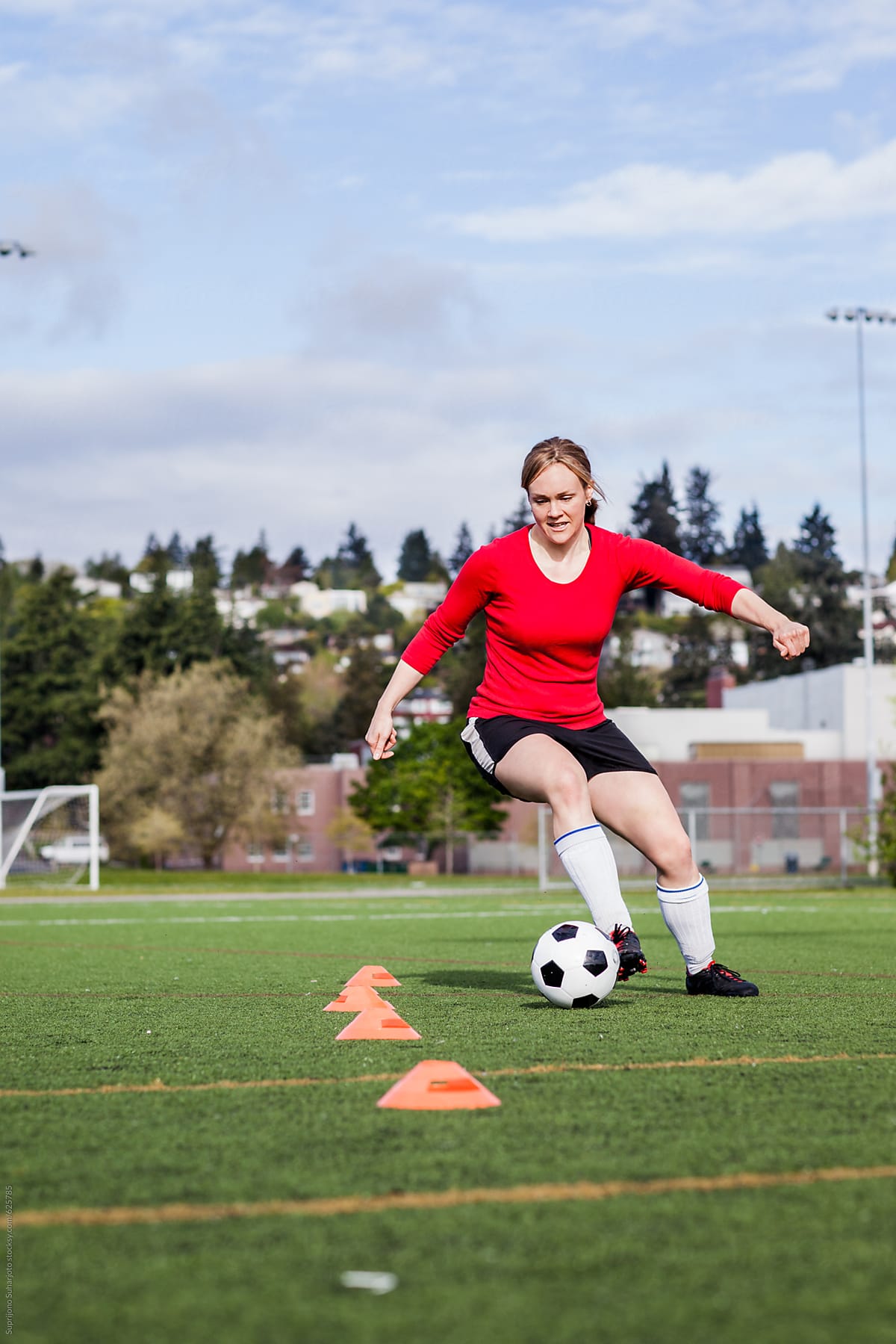 "Female Soccer Player Practicing On The Field" by Stocksy Contributor ...