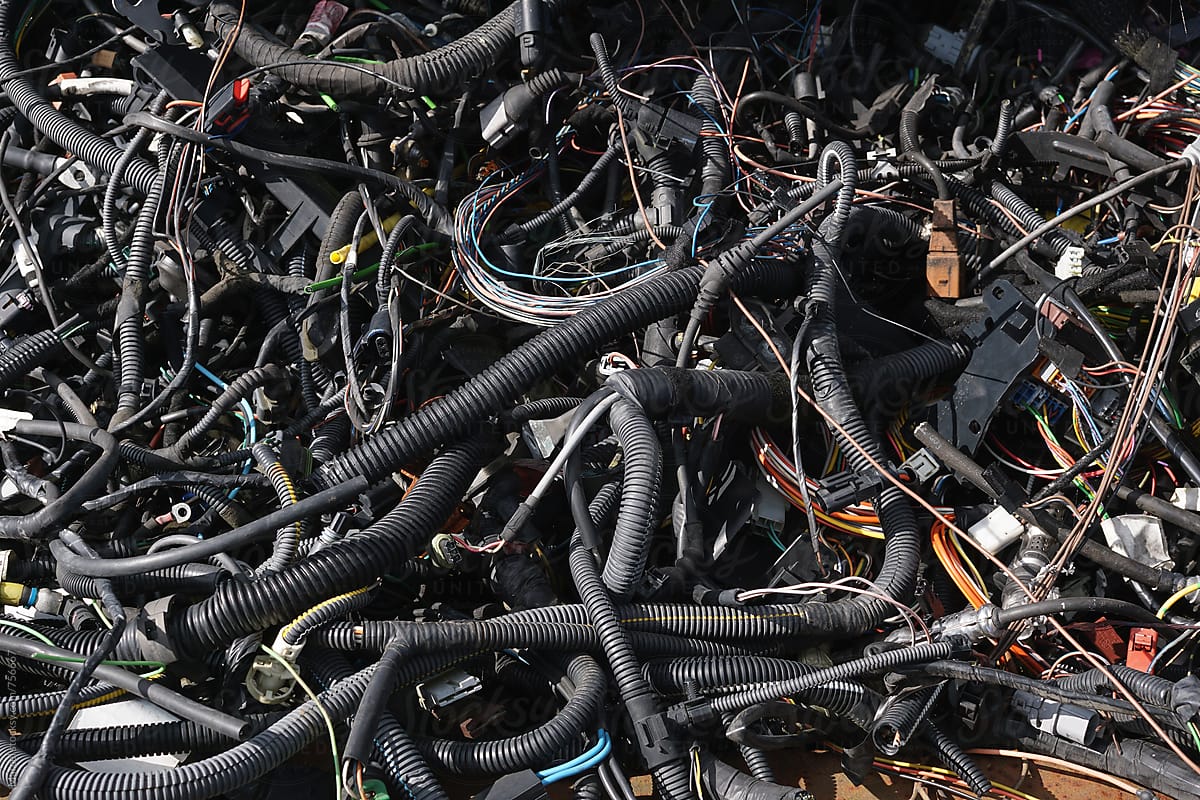"Automobile Parts At A Scrapyard" by Stocksy Contributor "Marcel" - Stocksy