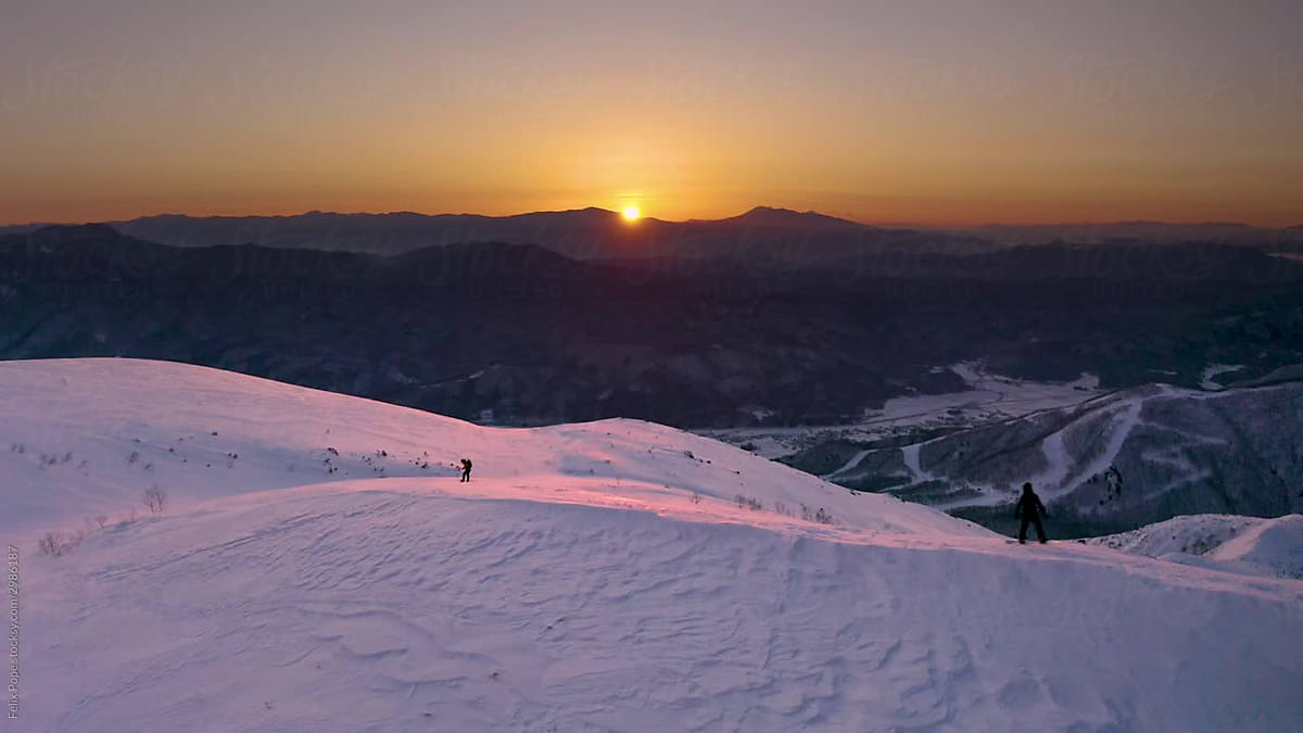 "Sunrise Snowboarding" by Stocksy Contributor "Felix Pope" - Stocksy