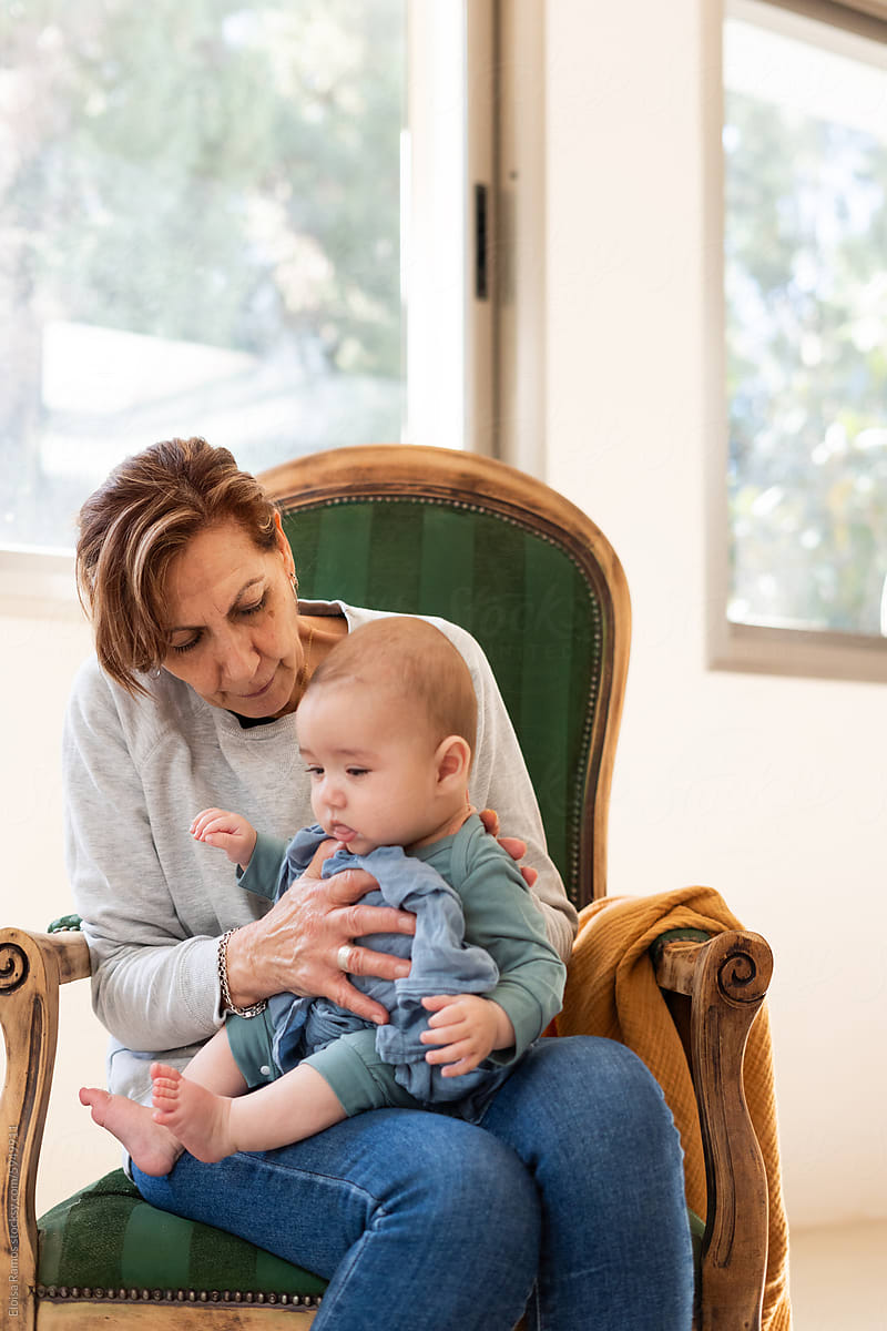 "Senior Woman Babysitting Baby Boy" by Stocksy Contributor "Eloisa ...