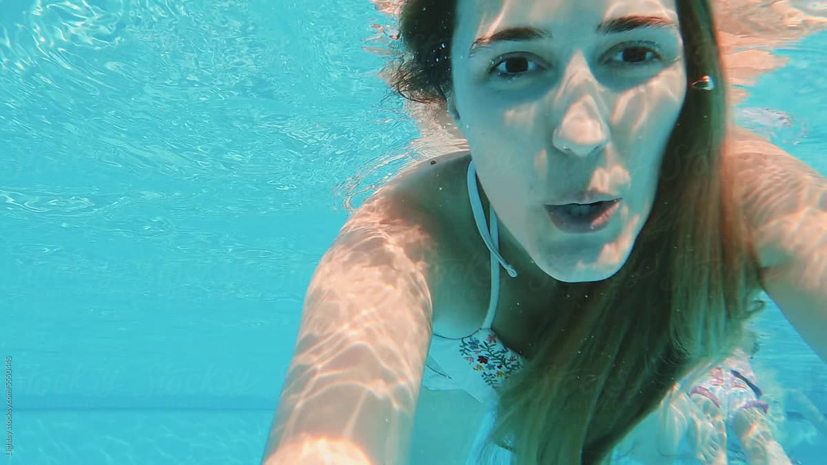 "A Woman Making Bubbles Underwater" by Stocksy Contributor "Lightsy ...