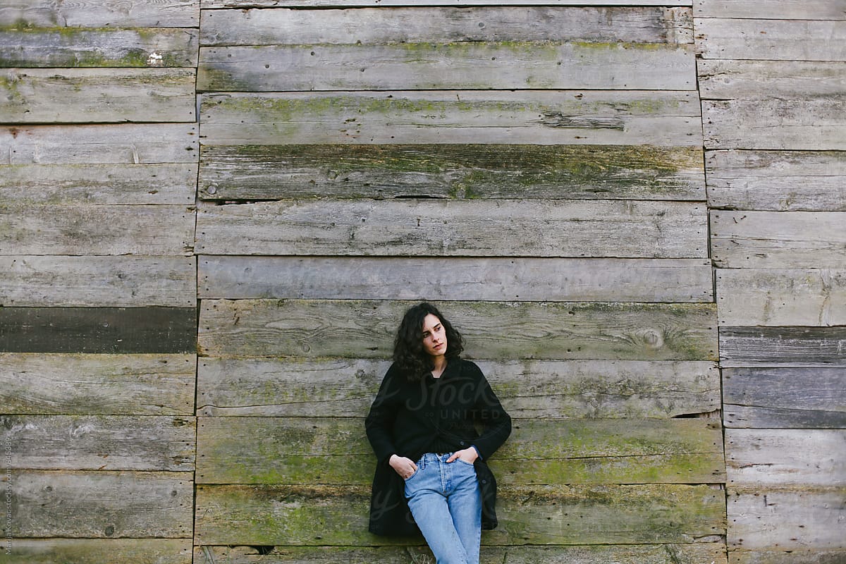 "Woman In Front Of A Wooden Wall" by Stocksy Contributor "Marija Kovac ...