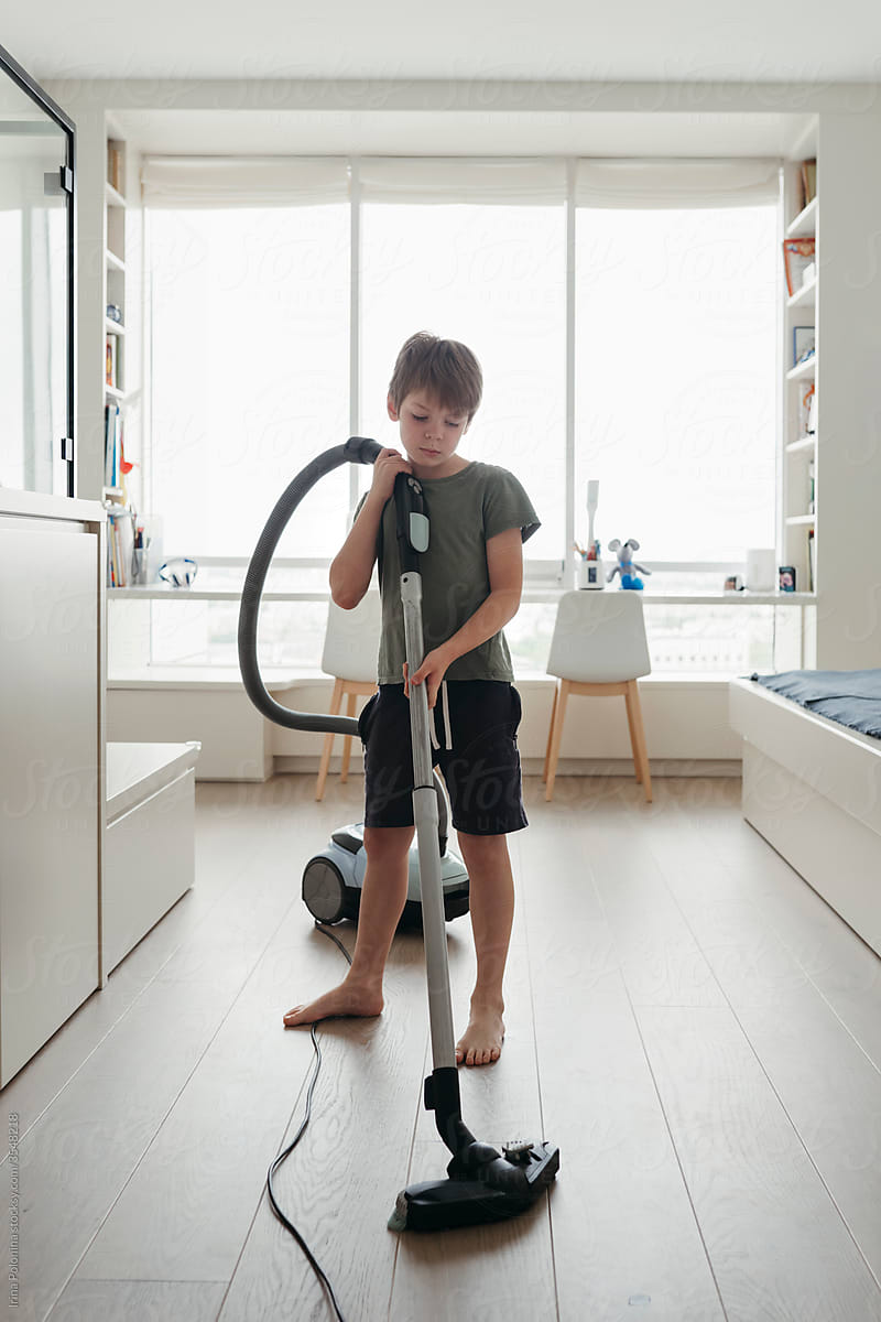"A Young Boy Is Cleaning The Room." by Stocksy Contributor "Irina ...