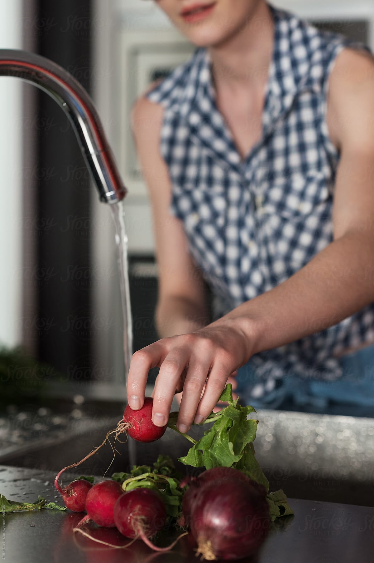"Woman Washing Radish In Sink" by Stocksy Contributor "Milles Team ...