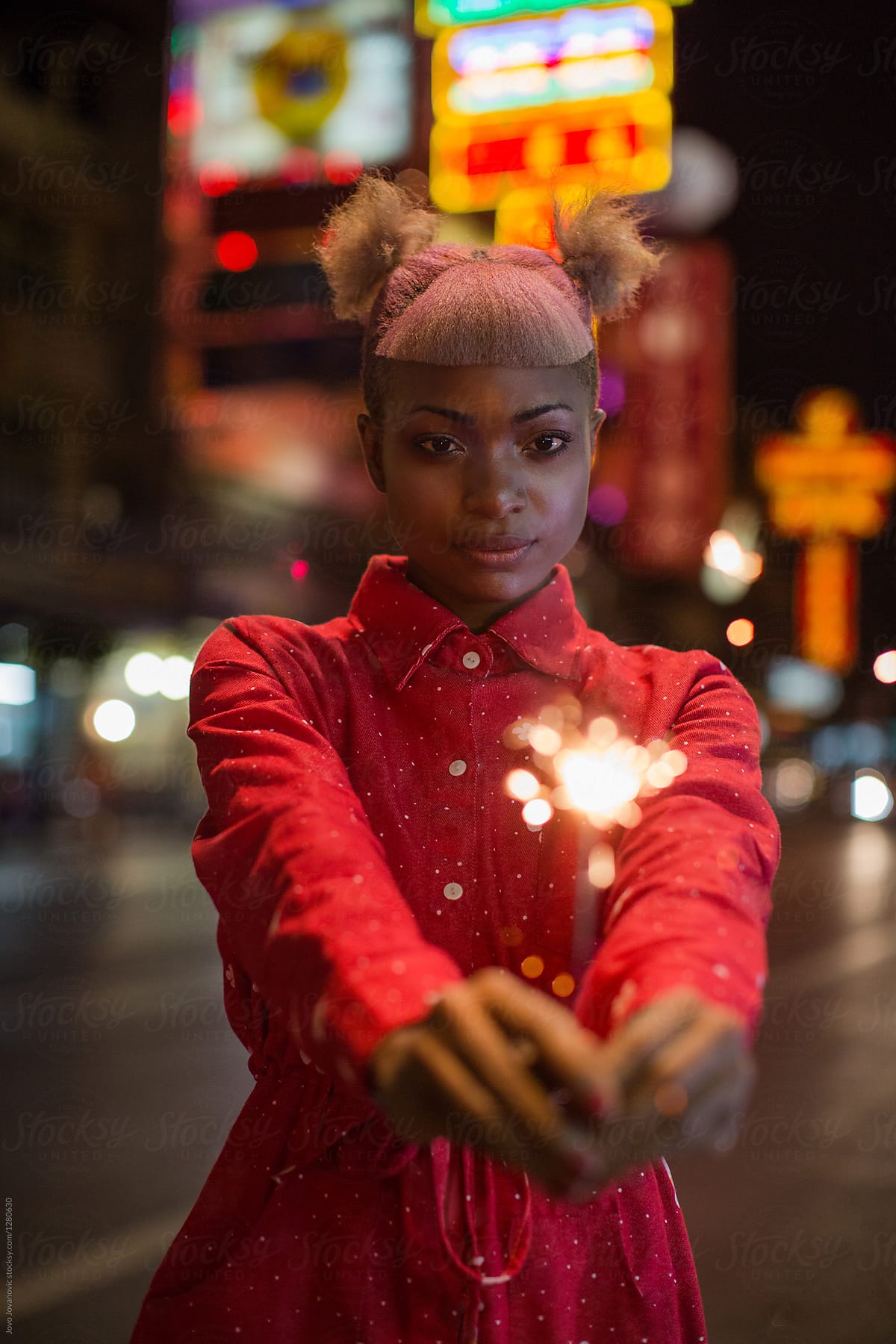 "Young Woman Holding A Sparkler Firework" by Stocksy Contributor "Jovo ...