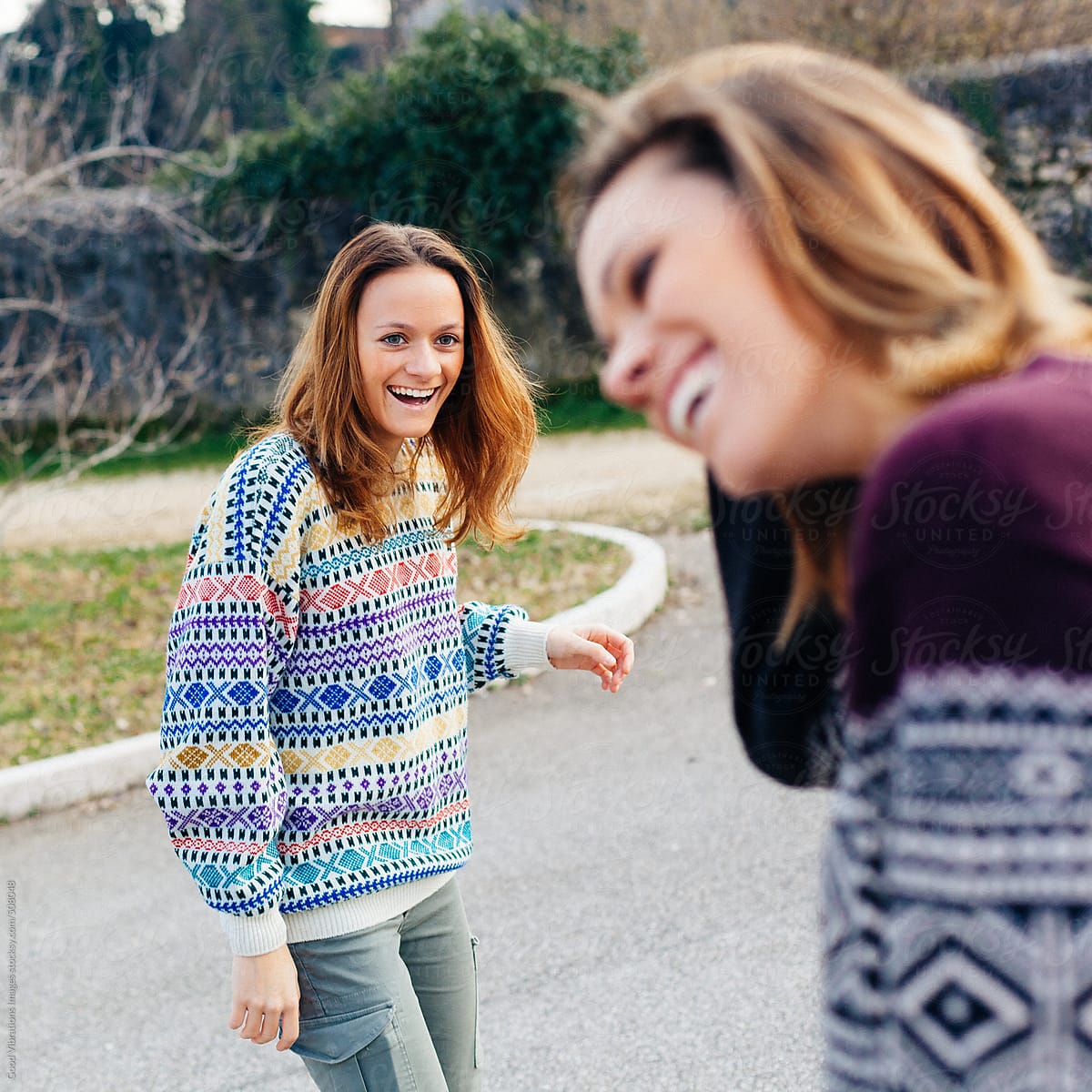 "Two Happy Friends Outdoors" by Stocksy Contributor "Vero." - Stocksy