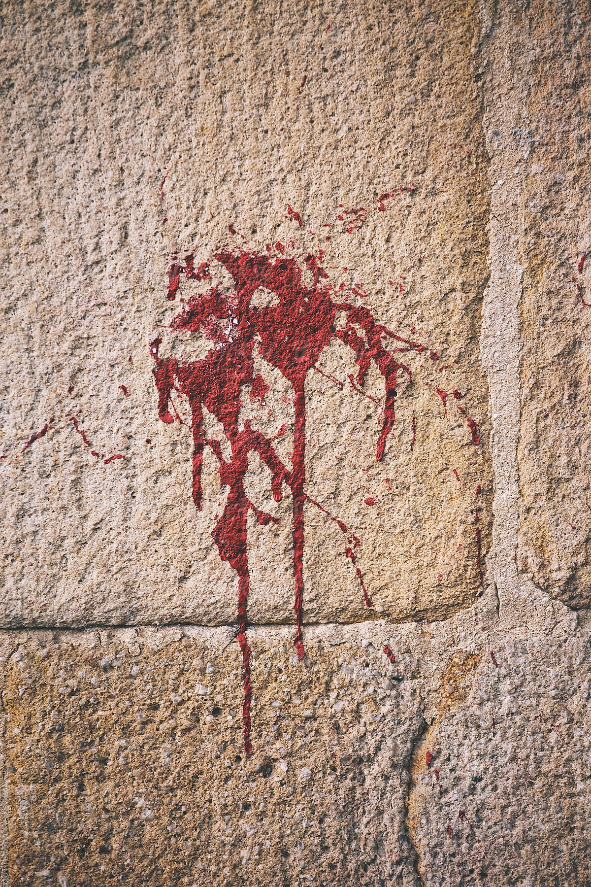 "Red Graffiti On Wall" by Stocksy Contributor "BONNINSTUDIO " - Stocksy